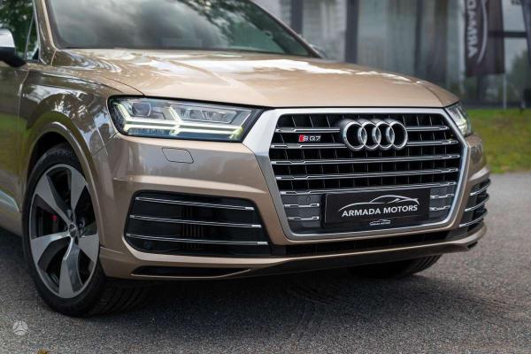 Yellow Audi SQ7 2017 in Vilnius, with an engine capacity of 3.96 L and mileage of 188 thousand km for 26900 €, photo 3 on AUTOMOTO.COM.LV