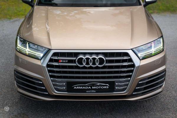 Yellow Audi SQ7 2017 in Vilnius, with an engine capacity of 3.96 L and mileage of 188 thousand km for 26900 €, photo 7 on AUTOMOTO.COM.LV