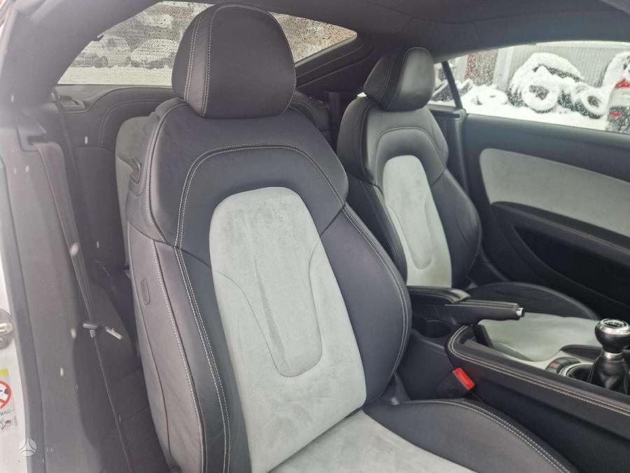 White Audi TT 2014 in Ukmerge, with an engine capacity of 1.80 L and mileage of 85 thousand km for 9849 €, photo 15 on AUTOMOTO.COM.LV
