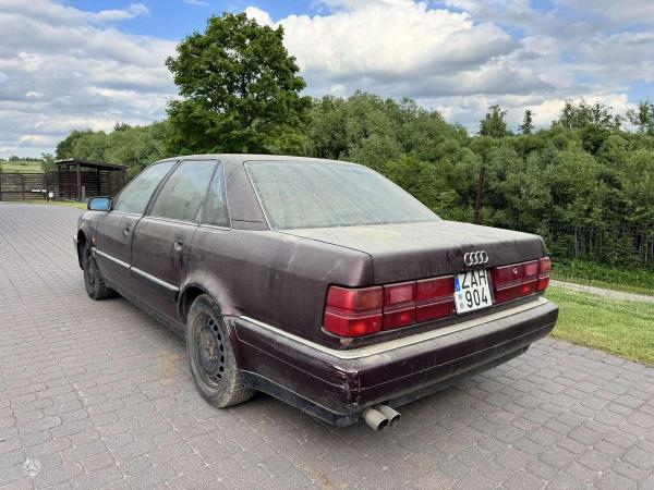 Red Audi V8 1989 in Alytus, with an engine capacity of 3.60 L and mileage of 317 thousand km for 3700 €, photo 3 on AUTOMOTO.COM.LV