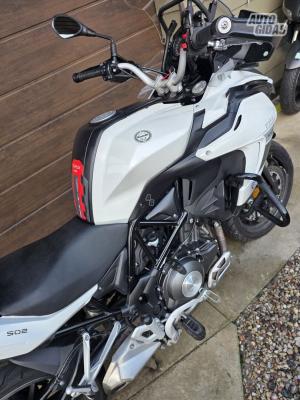 White Benelli TRK 502X 2021 in Pasvalys, with an engine capacity of 0.50 L and mileage of 19 thousand km for 2199 €, photo 14 on AUTOMOTO.COM.LV