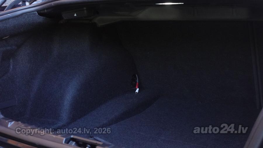 Black BMW 1-series 2008 in Tallinn, with an engine capacity of 3.50 L and mileage of 260 thousand km for 14999 €, photo 29 on AUTOMOTO.COM.LV