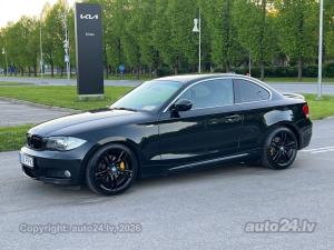 Black BMW 1-series 2009 in Narva, with an engine capacity of 2.00 L and mileage of 295 thousand km for 5999 €, photo  on AUTOMOTO.COM.LV