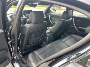 Melns BMW 1-series 2006 Tallina, ar dzinēja tilpumu 3.00 L un nobraukumu 257 tūkst. km par 10800 €, foto 14 vietnē AUTOMOTO.COM.LV