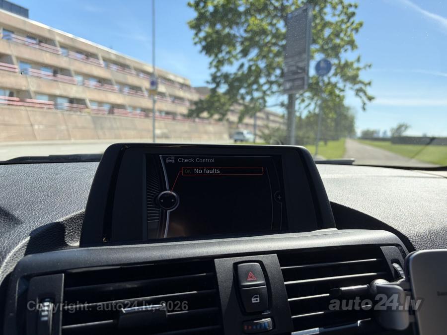 Melns BMW 1-series 2011 Tallina, ar dzinēja tilpumu 1.60 L un nobraukumu 202 tūkst. km par 7790 €, foto 14 vietnē AUTOMOTO.COM.LV