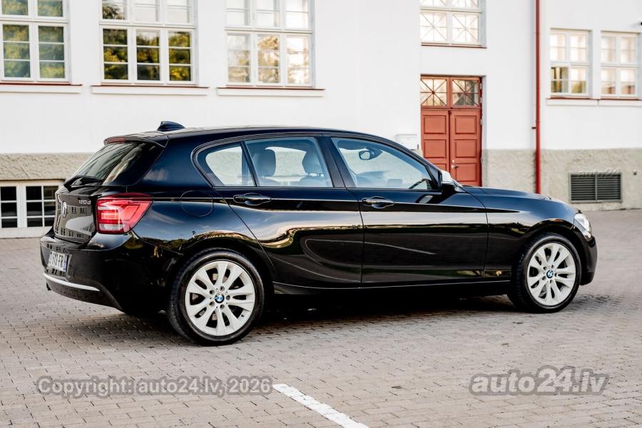 Black BMW 1-series 2012 in Parnu, with an engine capacity of 2.00 L and mileage of 230 thousand km for 6999 €, photo 6 on AUTOMOTO.COM.LV