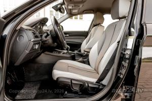 Black BMW 1-series 2012 in Parnu, with an engine capacity of 2.00 L and mileage of 230 thousand km for 6999 €, photo 15 on AUTOMOTO.COM.LV