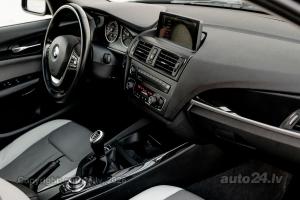 Black BMW 1-series 2012 in Parnu, with an engine capacity of 2.00 L and mileage of 230 thousand km for 6999 €, photo 19 on AUTOMOTO.COM.LV