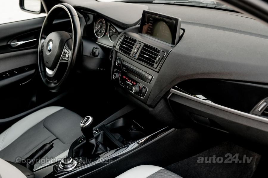 Black BMW 1-series 2012 in Parnu, with an engine capacity of 2.00 L and mileage of 230 thousand km for 6999 €, photo 19 on AUTOMOTO.COM.LV