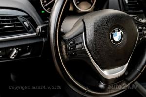 Black BMW 1-series 2012 in Parnu, with an engine capacity of 2.00 L and mileage of 230 thousand km for 6999 €, photo 23 on AUTOMOTO.COM.LV