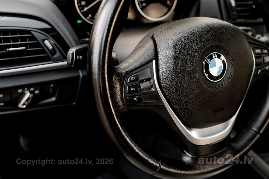 Black BMW 1-series 2012 in Parnu, with an engine capacity of 2.00 L and mileage of 230 thousand km for 6999 €, photo 23 on AUTOMOTO.COM.LV
