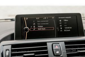Black BMW 1-series 2012 in Parnu, with an engine capacity of 2.00 L and mileage of 230 thousand km for 6999 €, photo 26 on AUTOMOTO.COM.LV