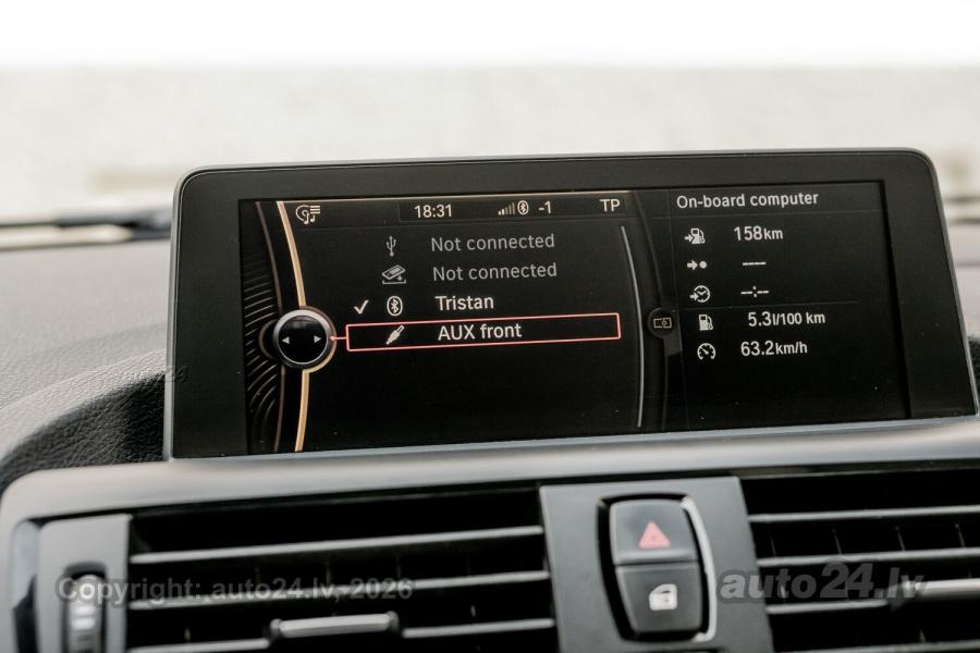 Black BMW 1-series 2012 in Parnu, with an engine capacity of 2.00 L and mileage of 230 thousand km for 6999 €, photo 26 on AUTOMOTO.COM.LV
