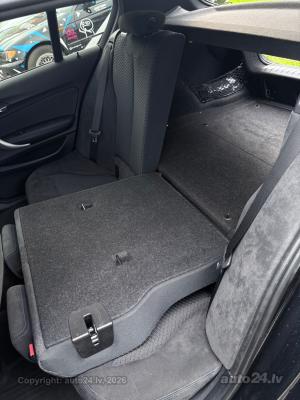 Black BMW 1-series 2016 in Tallinn, with an engine capacity of 2.00 L and mileage of 273 thousand km for 13600 €, photo 17 on AUTOMOTO.COM.LV
