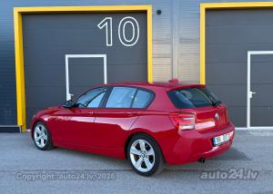 Red BMW 1-series 2012 in Tartu, with an engine capacity of 2.00 L and mileage of 239 thousand km for 4199 €, photo 5 on AUTOMOTO.COM.LV