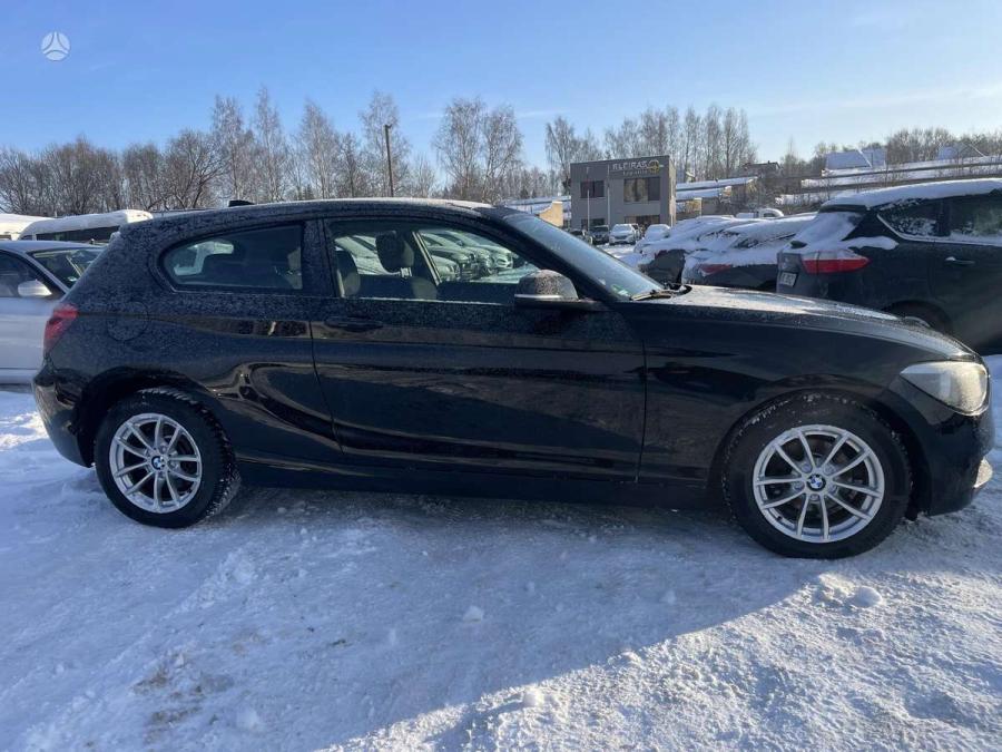 Black BMW 114 2013 in Utena, with an engine capacity of 1.60 L and mileage of 127 thousand km for 4450 €, photo 2 on AUTOMOTO.COM.LV