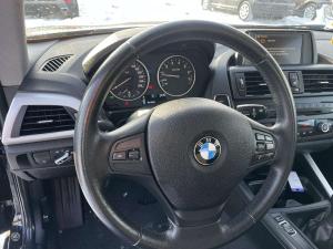 Black BMW 114 2013 in Utena, with an engine capacity of 1.60 L and mileage of 127 thousand km for 4450 €, photo 3 on AUTOMOTO.COM.LV