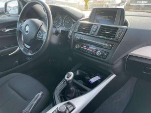 Black BMW 114 2013 in Utena, with an engine capacity of 1.60 L and mileage of 127 thousand km for 4450 €, photo 6 on AUTOMOTO.COM.LV