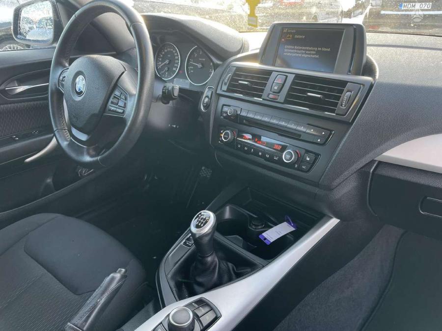 Black BMW 114 2013 in Utena, with an engine capacity of 1.60 L and mileage of 127 thousand km for 4450 €, photo 6 on AUTOMOTO.COM.LV