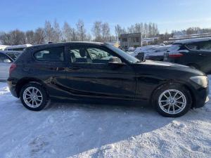 Black BMW 114 2013 in Utena, with an engine capacity of 1.60 L and mileage of 127 thousand km for 4450 €, photo 13 on AUTOMOTO.COM.LV