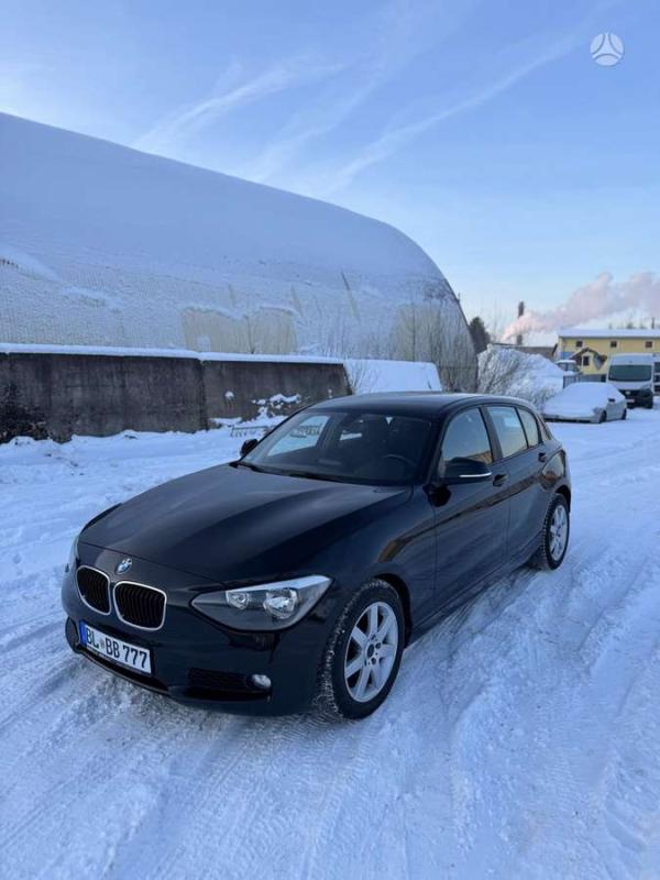 Black BMW 114 2013 in Panevezys, with an engine capacity of 1.60 L and mileage of 166 thousand km for 5600 €, photo 1 on AUTOMOTO.COM.LV