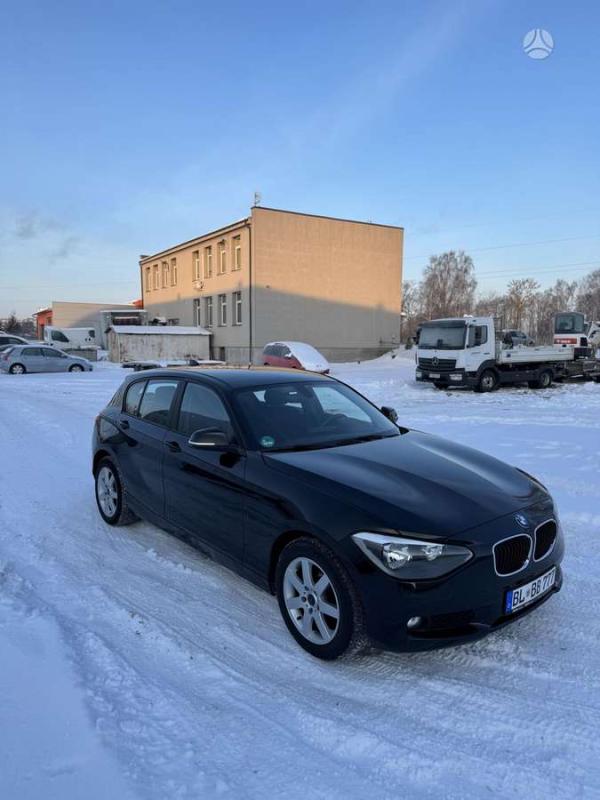 Black BMW 114 2013 in Panevezys, with an engine capacity of 1.60 L and mileage of 166 thousand km for 5600 €, photo 3 on AUTOMOTO.COM.LV