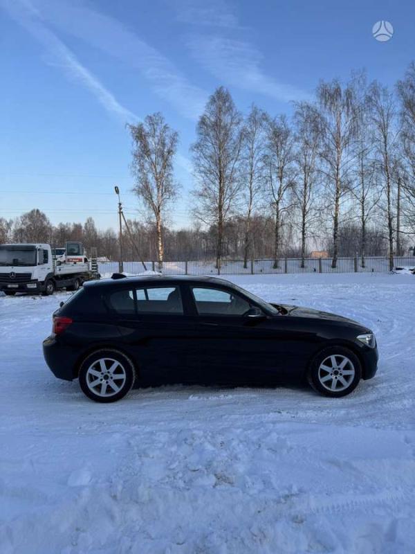 Black BMW 114 2013 in Panevezys, with an engine capacity of 1.60 L and mileage of 166 thousand km for 5600 €, photo 7 on AUTOMOTO.COM.LV
