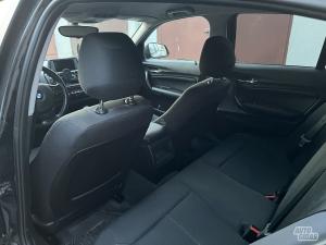 Black BMW 114 2013 in Vilnius, with an engine capacity of 1.60 L and mileage of 204 thousand km for 4200 €, photo 11 on AUTOMOTO.COM.LV