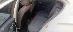 White BMW 114 2014 in Kaunas, with an engine capacity of 1.60 L and mileage of 204 thousand km for 5399 €, photo 11 on AUTOMOTO.COM.LV