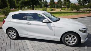 White BMW 114 2014 in Marijampole, with an engine capacity of 1.60 L and mileage of 154 thousand km for 5450 €, photo 5 on AUTOMOTO.COM.LV