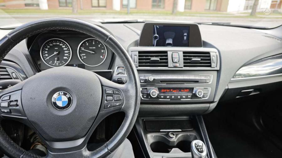 White BMW 114 2014 in Marijampole, with an engine capacity of 1.60 L and mileage of 154 thousand km for 5450 €, photo 9 on AUTOMOTO.COM.LV