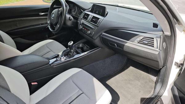 White BMW 114 2014 in Marijampole, with an engine capacity of 1.60 L and mileage of 154 thousand km for 5450 €, photo 9 on AUTOMOTO.COM.LV