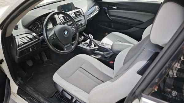 White BMW 114 2014 in Marijampole, with an engine capacity of 1.60 L and mileage of 154 thousand km for 5450 €, photo 10 on AUTOMOTO.COM.LV