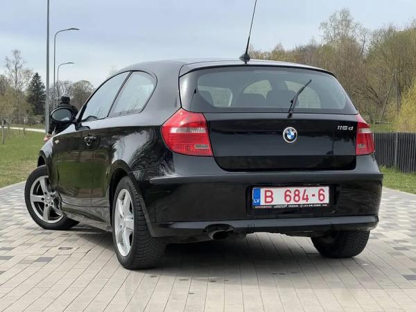 Black BMW 116 2009 in Rezekne, with an engine capacity of 2.00 L and mileage of 273 thousand km for 2500 €, photo 5 on AUTOMOTO.COM.LV