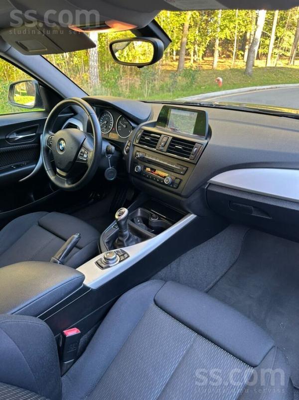 BMW 116 2012 in Jelgava on AUTOMOTO.COM.LV Black BMW 116 2012 in Jelgava, with an engine capacity of 1.60 L and mileage of 241 thousand km for 4450 €, photo 6 on AUTOMOTO.COM.LV