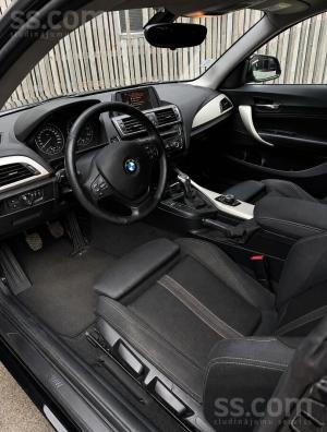 Black BMW 116 2015 in Riga, with an engine capacity of 1.50 L and mileage of 138 thousand km for 8100 €, photo 7 on AUTOMOTO.COM.LV