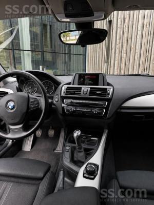 Black BMW 116 2015 in Riga, with an engine capacity of 1.50 L and mileage of 138 thousand km for 8100 €, photo 9 on AUTOMOTO.COM.LV
