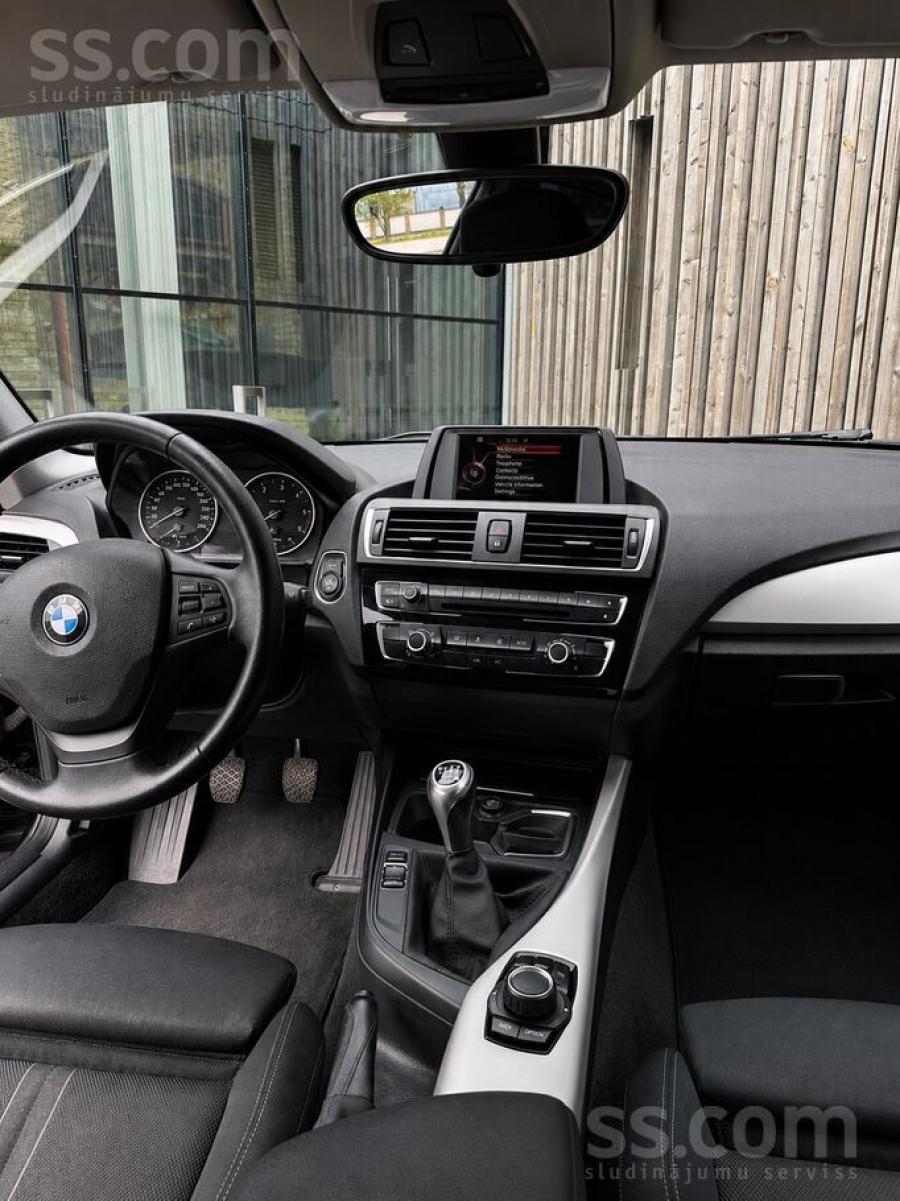 Black BMW 116 2015 in Riga, with an engine capacity of 1.50 L and mileage of 138 thousand km for 8100 €, photo 9 on AUTOMOTO.COM.LV