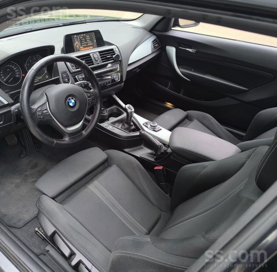 Black BMW 116 2015 in Riga, with an engine capacity of 1.60 L and mileage of 268 thousand km for 7500 €, photo 6 on AUTOMOTO.COM.LV