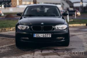 Black BMW 116 2005 in Riga, with an engine capacity of 1.60 L and mileage of 140 thousand km for 2390 €, photo 2 on AUTOMOTO.COM.LV