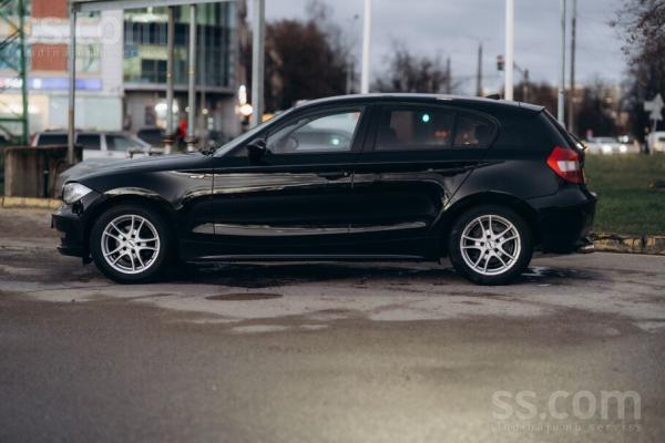 Black BMW 116 2005 in Riga, with an engine capacity of 1.60 L and mileage of 140 thousand km for 2390 €, photo 7 on AUTOMOTO.COM.LV
