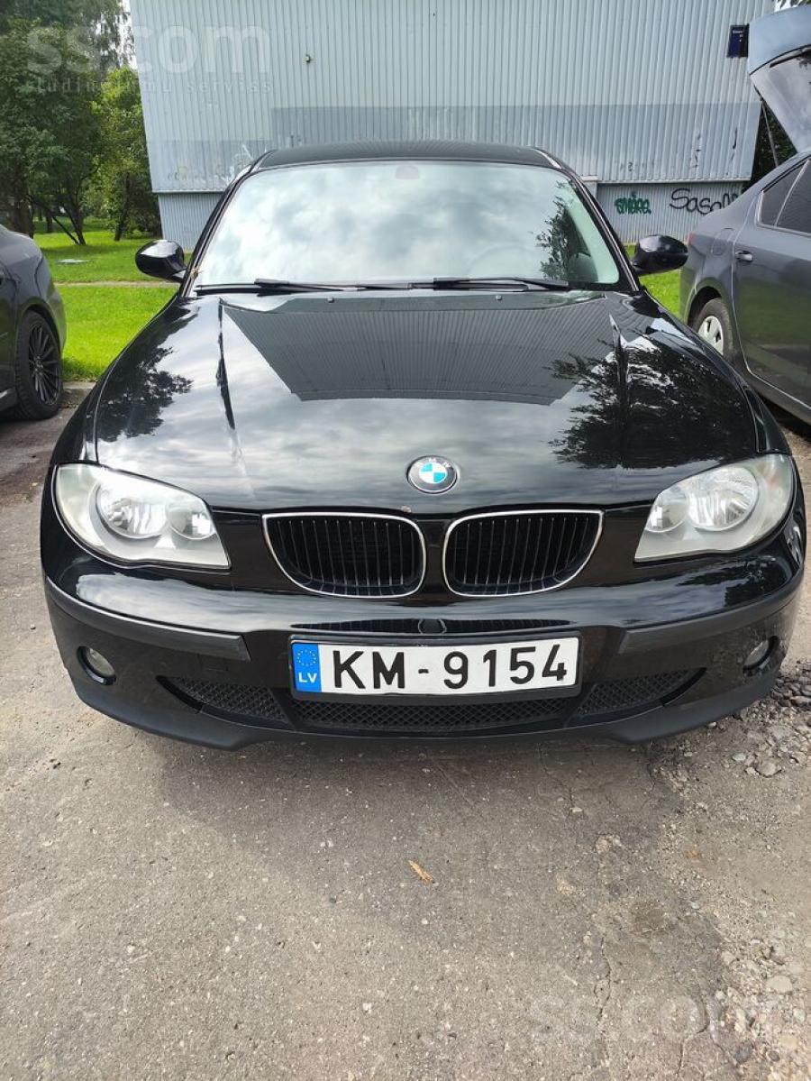 Black BMW 116 2005 in Riga, with an engine capacity of 1.60 L and mileage of 233 thousand km for 1990 €, photo 1 on AUTOMOTO.COM.LV