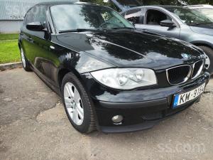Black BMW 116 2005 in Riga, with an engine capacity of 1.60 L and mileage of 233 thousand km for 1990 €, photo 3 on AUTOMOTO.COM.LV