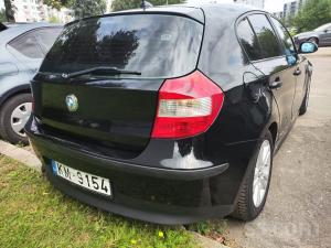 Black BMW 116 2005 in Riga, with an engine capacity of 1.60 L and mileage of 233 thousand km for 1990 €, photo 4 on AUTOMOTO.COM.LV
