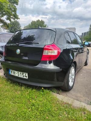 Black BMW 116 2005 in Riga, with an engine capacity of 1.60 L and mileage of 233 thousand km for 1990 €, photo 6 on AUTOMOTO.COM.LV