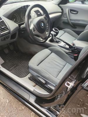 Black BMW 116 2005 in Riga, with an engine capacity of 1.60 L and mileage of 233 thousand km for 1990 €, photo 7 on AUTOMOTO.COM.LV