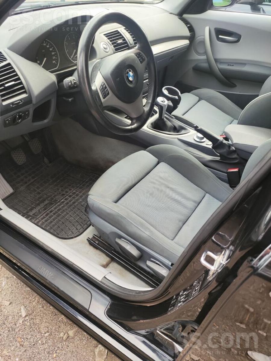 Black BMW 116 2005 in Riga, with an engine capacity of 1.60 L and mileage of 233 thousand km for 1990 €, photo 7 on AUTOMOTO.COM.LV