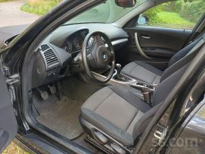 Black BMW 116 2005 in Riga, with an engine capacity of 1.60 L and mileage of 256 thousand km for 1500 €, photo 6 on AUTOMOTO.COM.LV