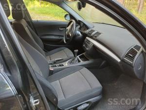 Black BMW 116 2005 in Riga, with an engine capacity of 1.60 L and mileage of 256 thousand km for 1500 €, photo 7 on AUTOMOTO.COM.LV
