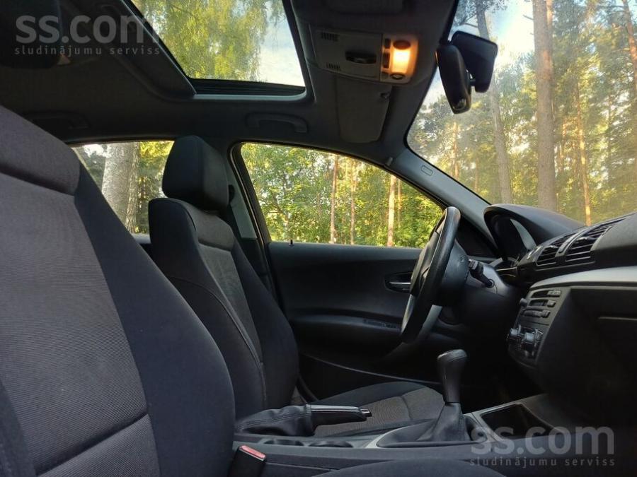 Black BMW 116 2005 in Riga, with an engine capacity of 1.60 L and mileage of 256 thousand km for 1500 €, photo 8 on AUTOMOTO.COM.LV